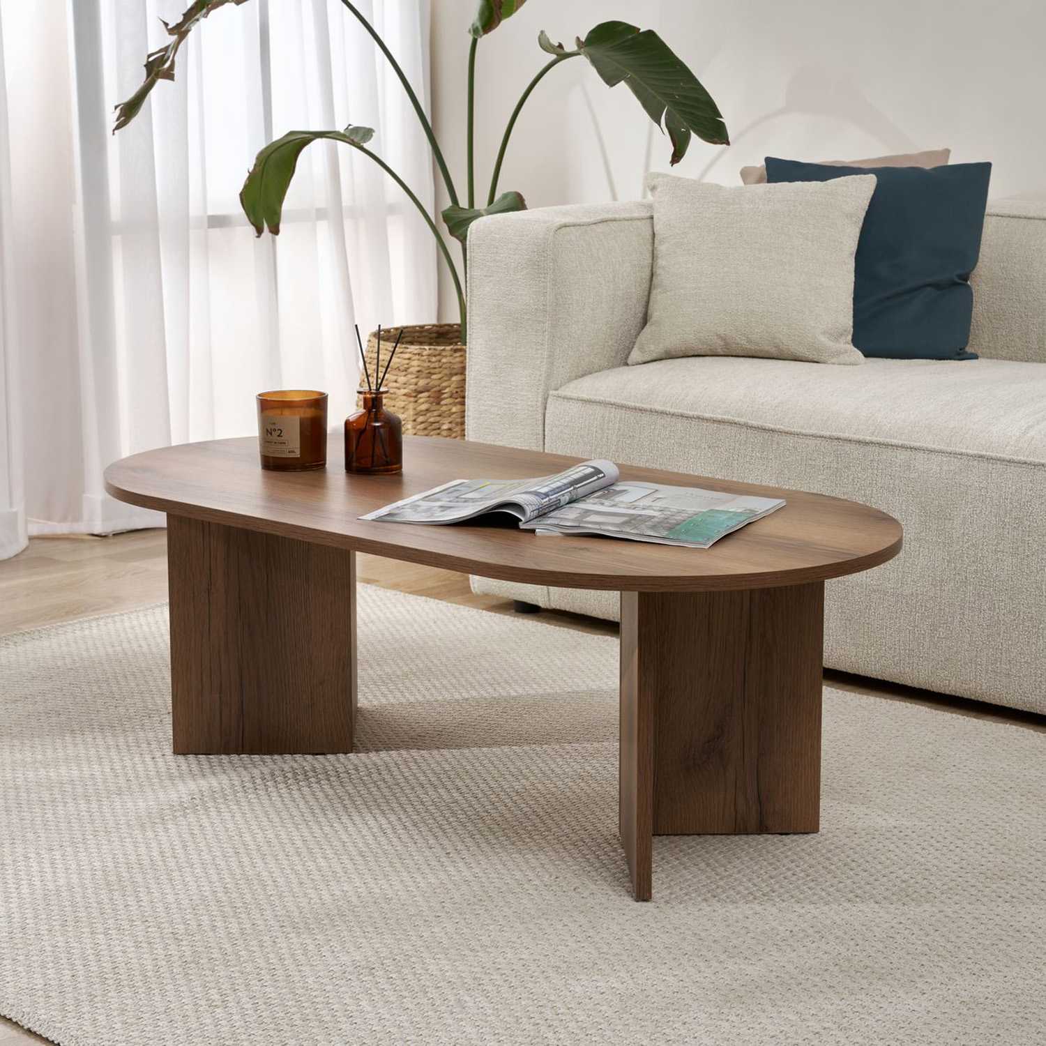 Table basse ovale en aggloméré sable (noyer vielli)